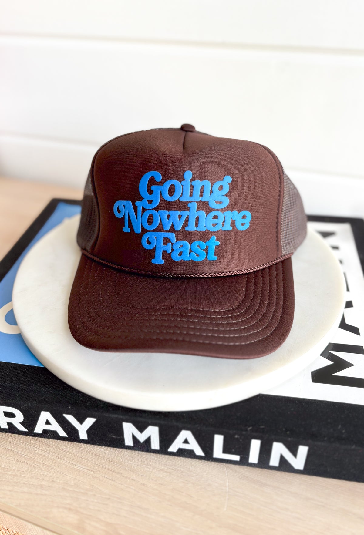 Going Nowhere Fast Trucker Hat in Brown | Groovy's